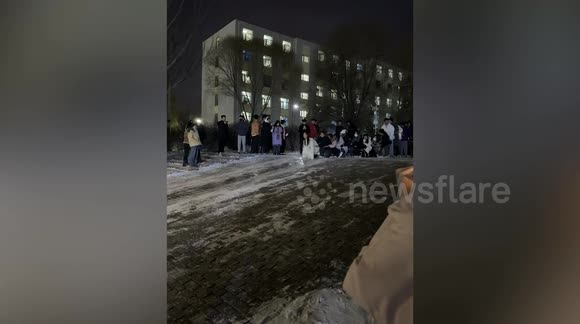 Youngsters make a human train to slide down icy slope - Buy, Sell or ...