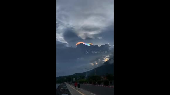 A rare and unique natural phenomenon, rainbow clouds in the sky of ...