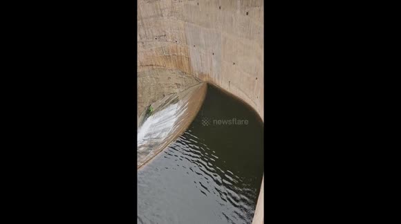 Carps fall into water funnel at a dam in Córdoba, Argentina - Buy, Sell ...