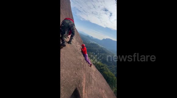 Hiker almost slides off cliff but is rescued by companion in nail ...