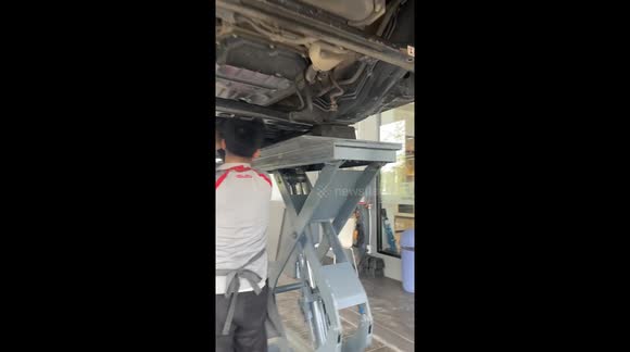 Mechanics remove monitor lizard stuck under car - Buy, Sell or Upload ...