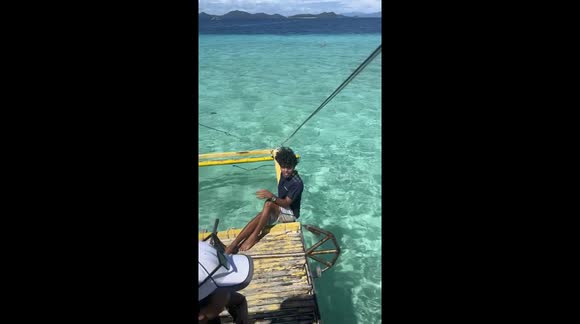 Filipino tour guide shows visitors how to strike a pose - Buy, Sell or ...