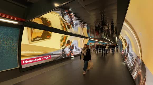 People walk along a stretch of the new corridor at the Spagna metro ...
