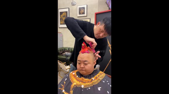 Chinese man gets rooster-inspired hairstyle - Buy, Sell or Upload Video ...