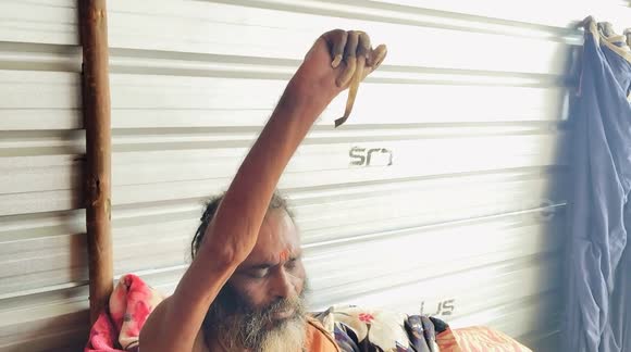 India: A Sadhu raise his hand since last 12 years - Buy, Sell or Upload ...