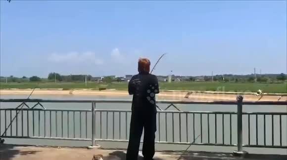 China: A Man Throw Himself Over the Railing During Fishing - Buy, Sell ...