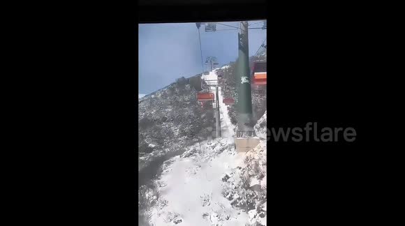 Young girl falls from ski chairlift and miraculously escapes unharmed ...