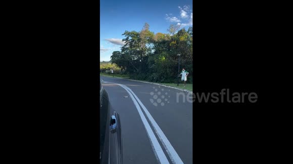 Gangster rapper shows his softer side by rescuing snake stuck in road ...