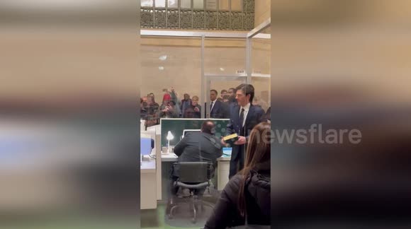 Severance cast pose in glass box at Grand Central Station in New York ...