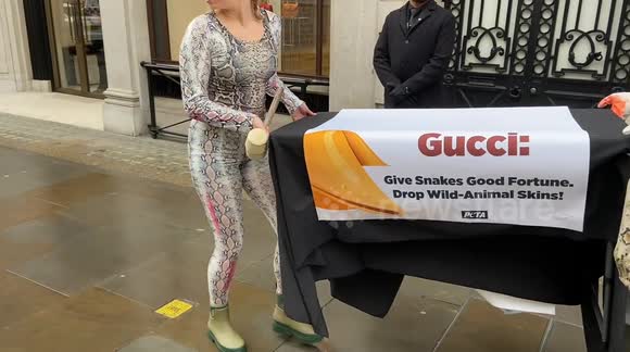 PETA activists shock passers-by outside Gucci in London with horrific ...