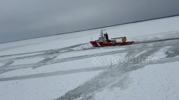Ice breakers rescue stranded vessel on frozen Lake Erie in New York ...