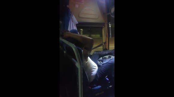 Bus driver 'sleeping at the wheel' is actually being pulled by tow ...