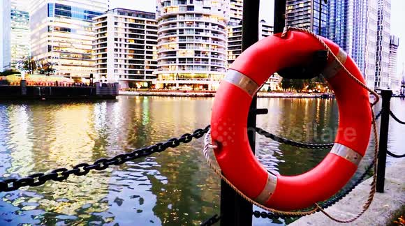 Lifebuoy on The Promenade Railing at South Quay, Canary Wharf, London ...