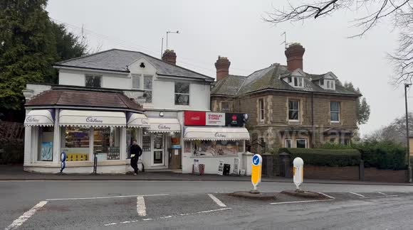 Hero shopkeeper hands over bread, butter and milk to hungry robber with ...