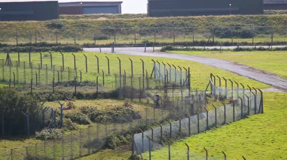 US Cold War Nuclear base decays slowly next to a busy tourist beach ...