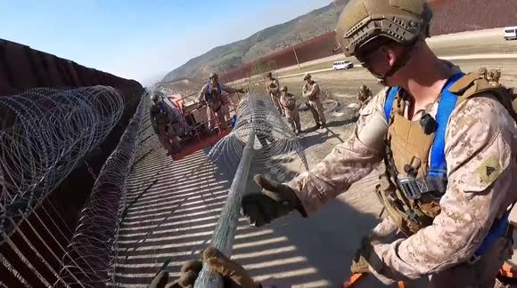 US: U.S. Marine Fortifies Southern Border with Razor Wire Amid Security ...