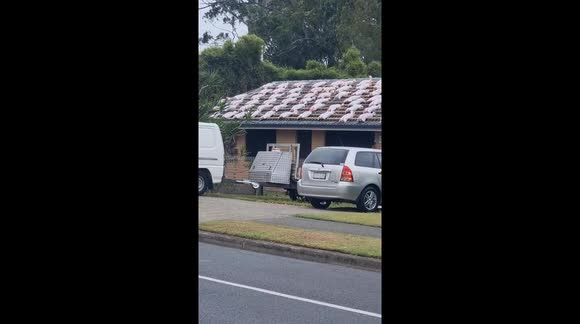 I came across a house who was preparing for the cyclone. But I was ...