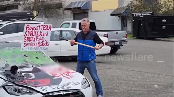 Shocking scenes show anti-Tesla protests in America - Buy, Sell or ...
