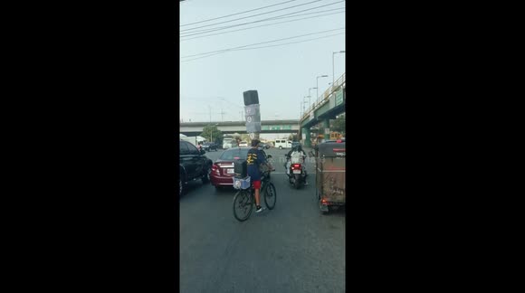 Delivery rider carries boxes stacked on his head - Buy, Sell or Upload ...