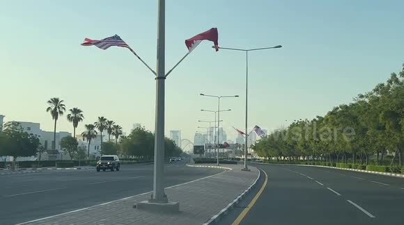Qatar: US, Qatari flags decorate Doha streets ahead of Trump's visit ...