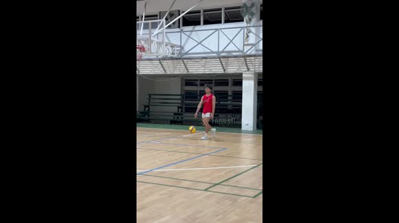 Volleyball player misses but still scores when ball bounces off face ...
