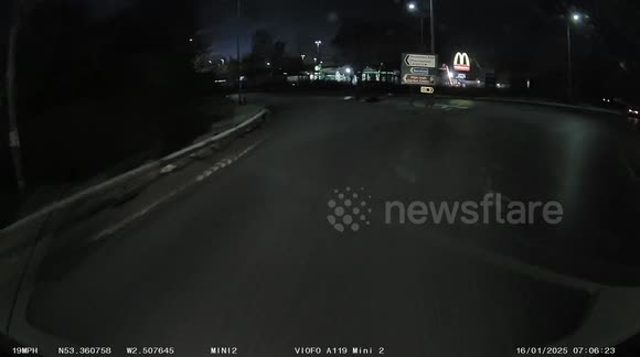 Trucker outside lymm services goes WRONG WAY around roundabout THREE ...