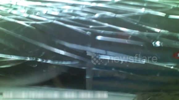 Car bonnet flies up and smashes windscreen while car's driving, causing ...