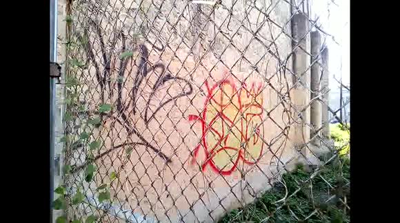 Graffiti Through Chain Link Fence - Buy, Sell or Upload Video Content ...