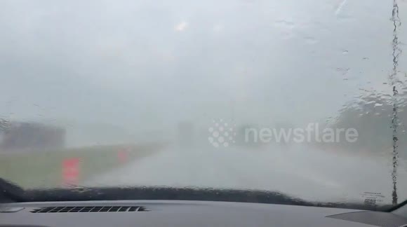 Blinding rain and mist cover windshield during storm in Jacksonburg ...