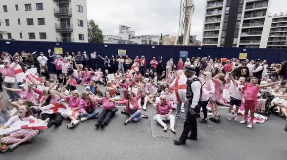 Anti Migrant Protestors sing Sweet Caroline as they block the road ...