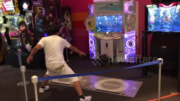 Watch this guy really go for it on a dance arcade game in Tokyo - Buy ...