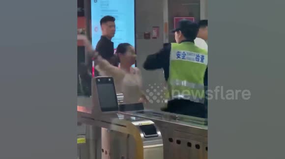 Female passenger detained over attack on subway security guard - Buy ...