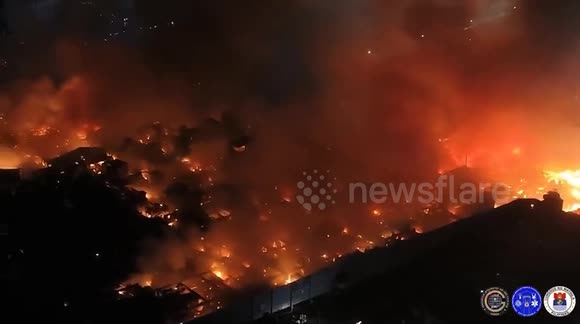 Three injured as large fire erupts in Philippine capital Manila - Buy ...