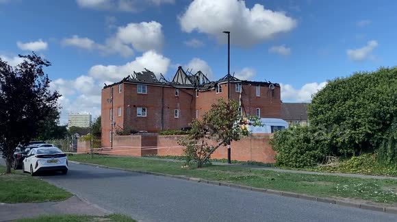 Three children taken to hospital after fire tears through three-storey ...
