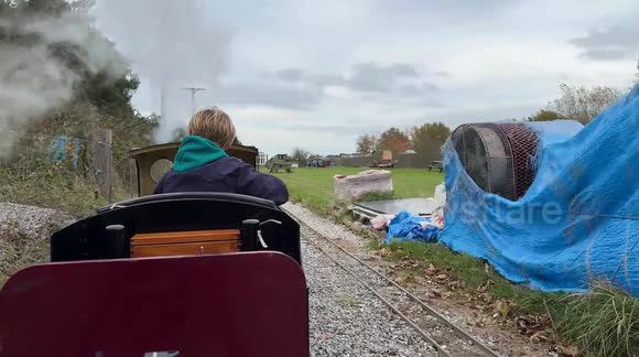 Train buff builds huge working miniature railway in his back garden ...