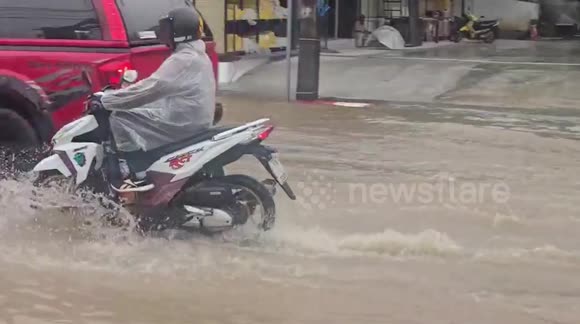 Floods submerge roads as heavy rain hits Thai island Phuket - Buy, Sell ...