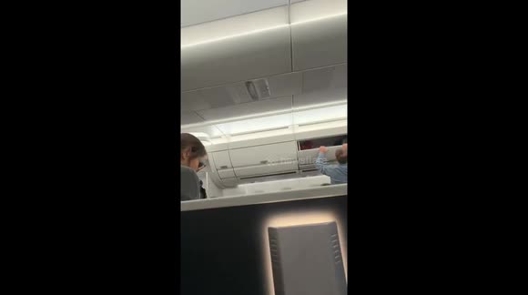 Touching moment couple's lost passports are found in plane so they can ...