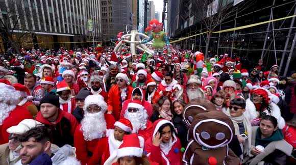Santas take over New York City for annual SantaCon event - Buy, Sell or ...