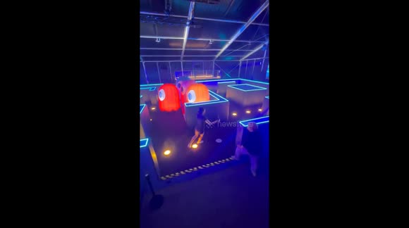 Exclusive- Woman dodges costumed ghosts in life‑sized Pac‑Man maze ...