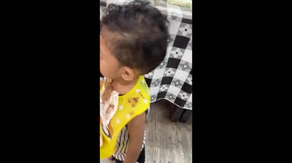 Child hilariously eats chocolate ice cream in Melaka, Malaysia - Buy ...