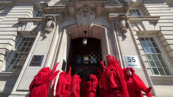 Red Rebel Brigade blocks entrance to Department for Energy Security ...