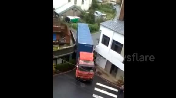 Lorry squeezes through narrow gap between houses - Buy, Sell or Upload ...