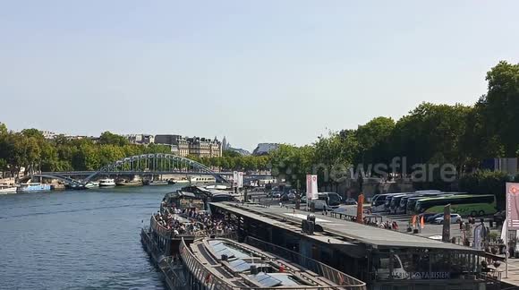 Horizontal POV of Crowded Pont d'Iéna Bridge and Seine River in Paris ...