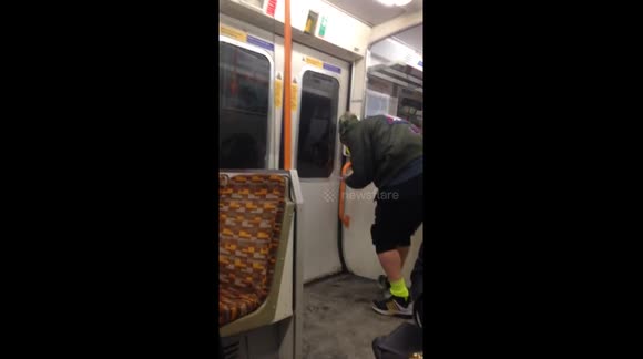Man laughs uncontrollably on London train - Buy, Sell or Upload Video ...